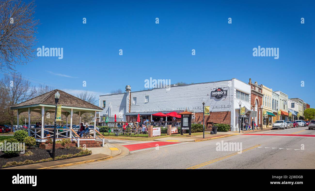 FORT MILL, S.C.-2 APRIL 22: Wide angle view of Main St. with residents ...