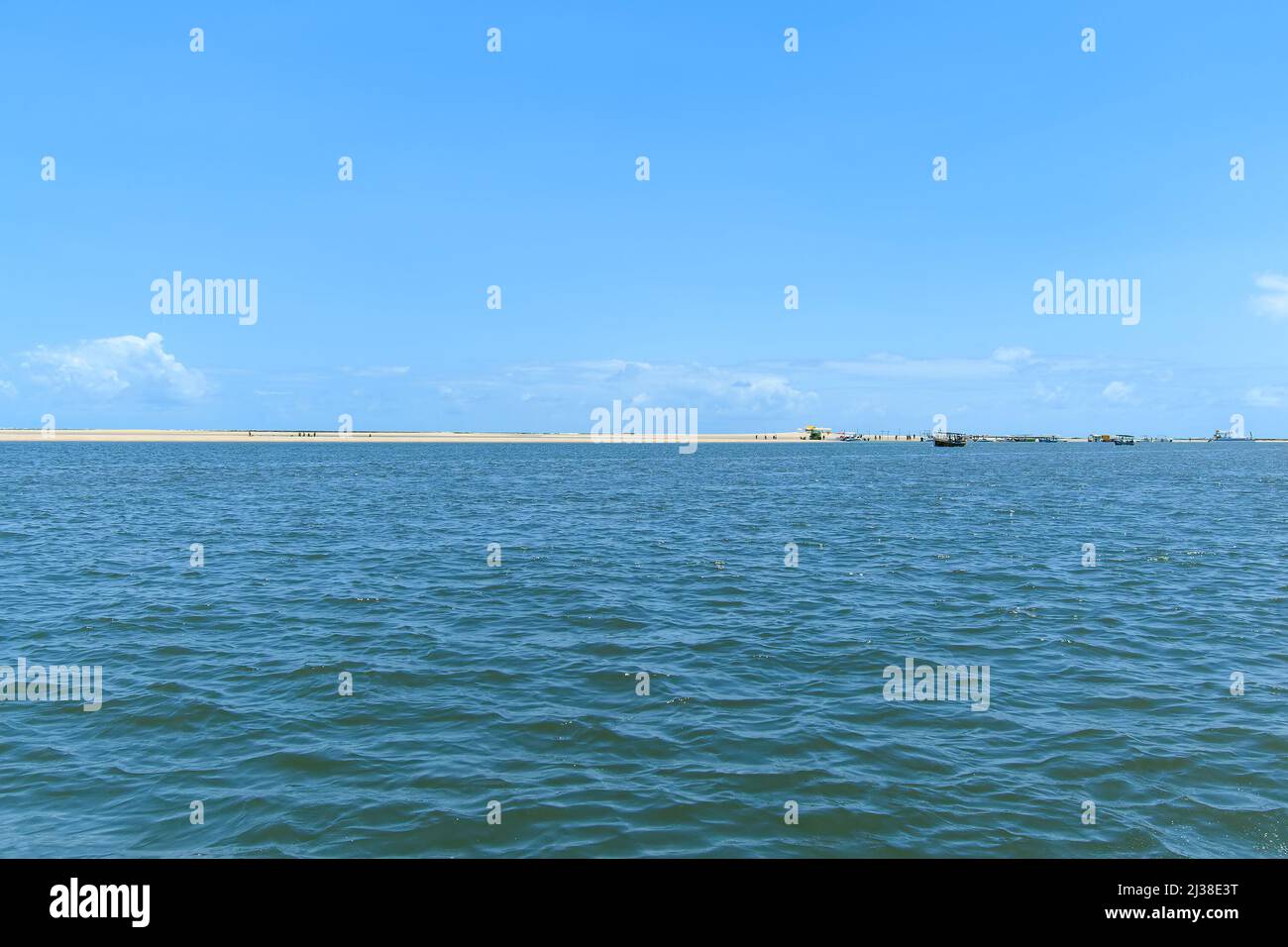 Beautiful landscape of a sand bank in the middle of the sea and some ...
