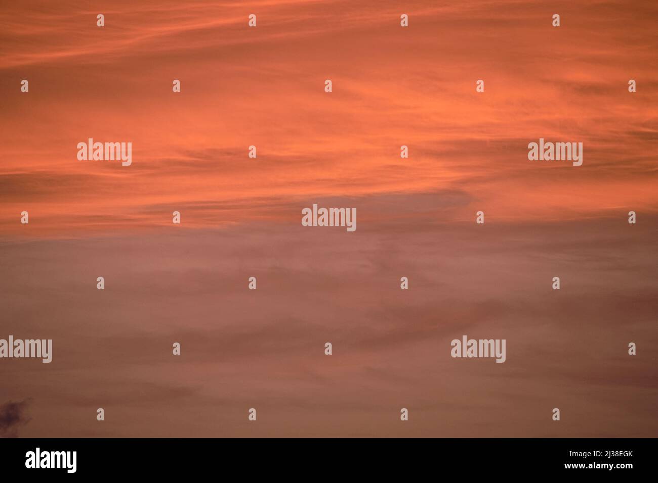 Sky light after sunset. orange background, clouds Stock Photo - Alamy