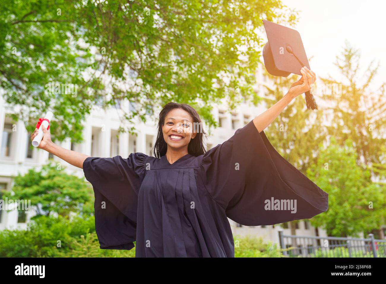 happy afro american university graduates at graduation ceremony Stock ...