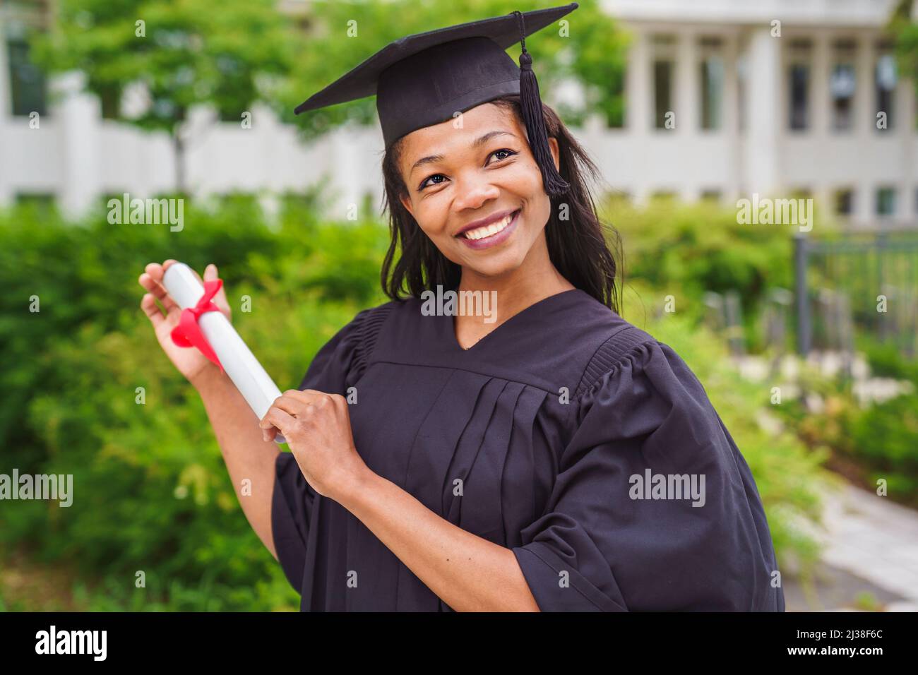 happy afro american university graduates at graduation ceremony Stock ...