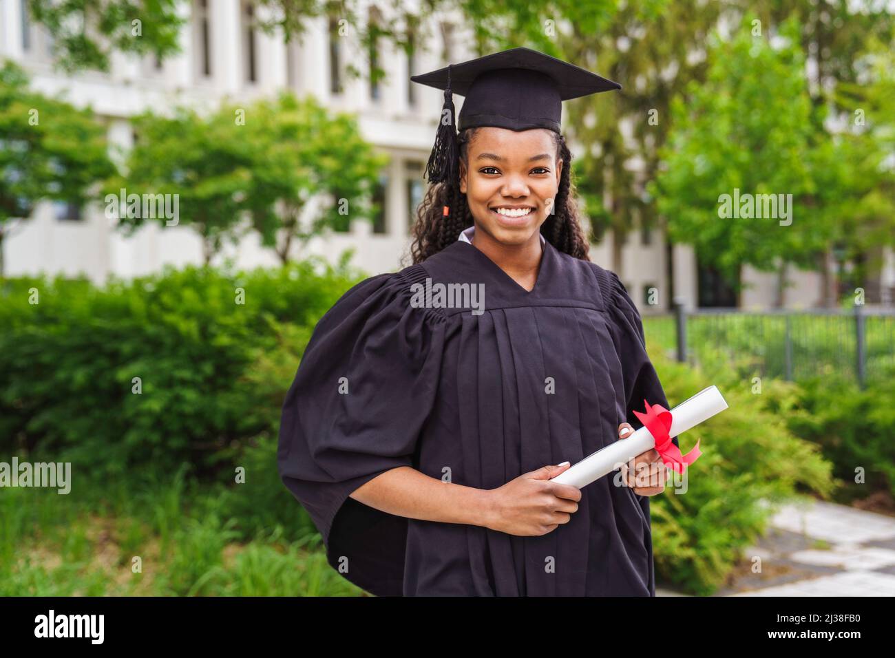 happy afro american university graduates at graduation ceremony Stock ...