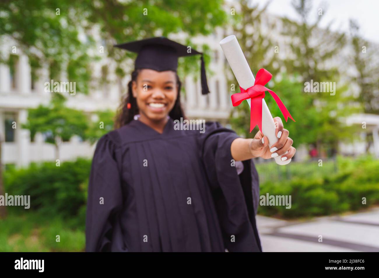 happy afro american university graduates at graduation ceremony Stock ...