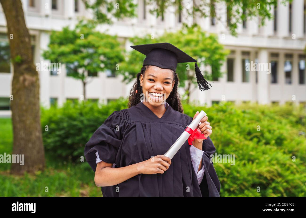 happy afro american university graduates at graduation ceremony Stock ...