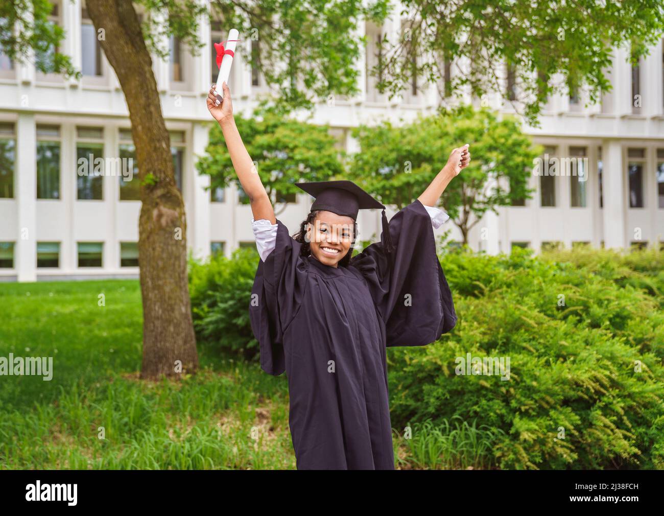 happy afro american university graduates at graduation ceremony Stock ...