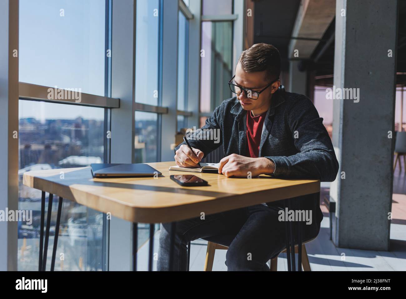 Successful manager working with cafe business information, investment ...