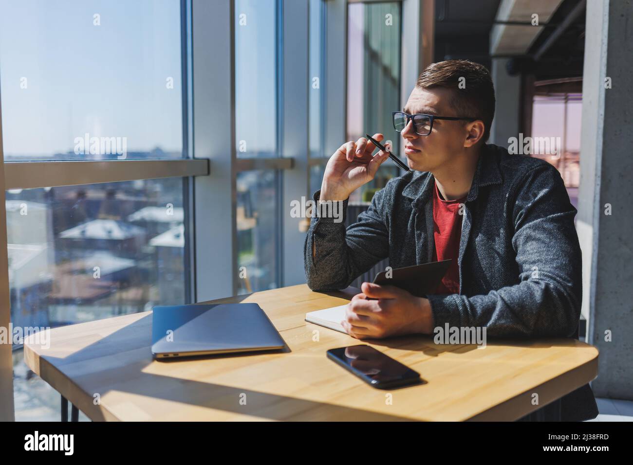 Successful manager working with cafe business information, investment ...