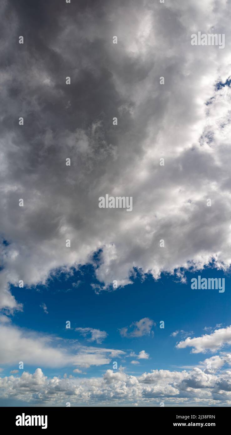 Fantastic soft thunderclouds, natural sky composition, vertical ...