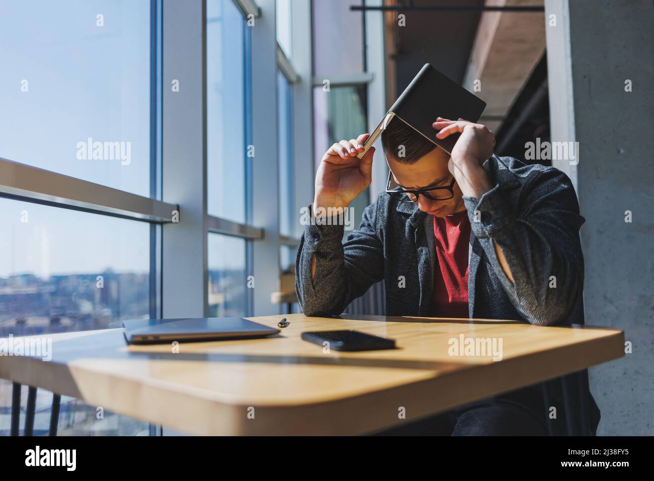 Successful manager working with cafe business information, investment ...