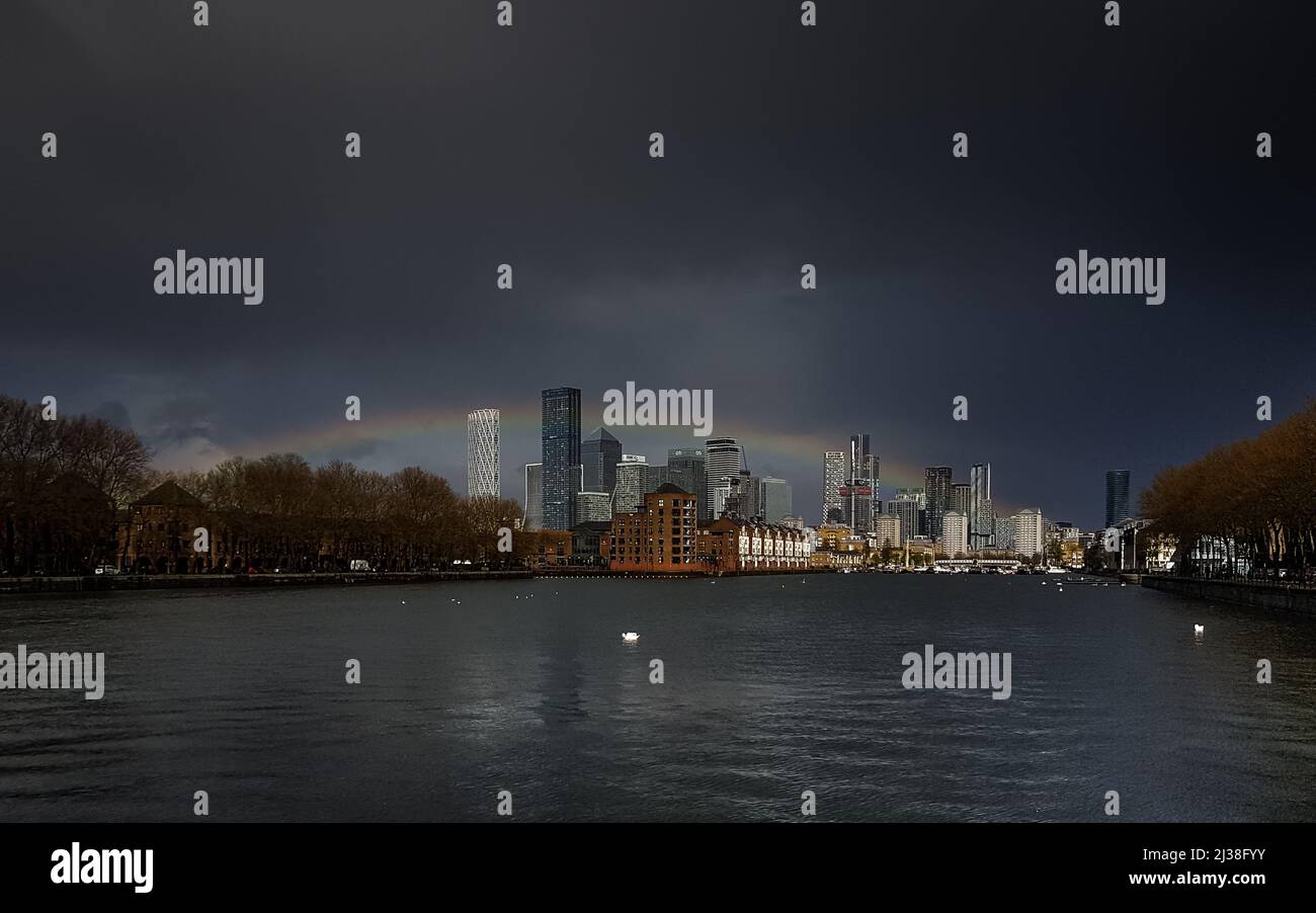London, UK. 6th April, 2022. UK Weather: A massive rainbow breaks over ...