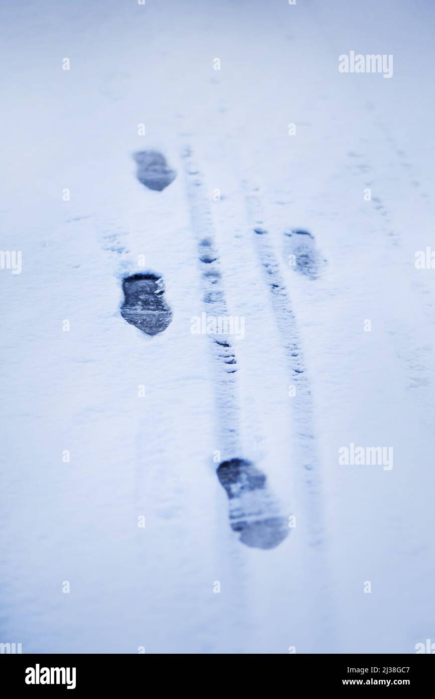 Footprints of a man who walked alone on a January day are left on the ...