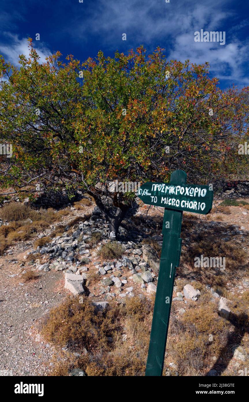 Signpost for footpath to the abandoned village of Mikro Horio, Tilos ...