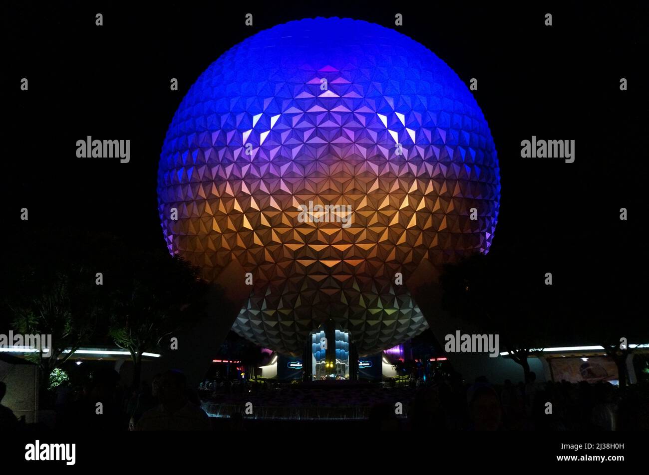 A closeup shot of Spaceship Earth at Epcot in Disney World at night ...