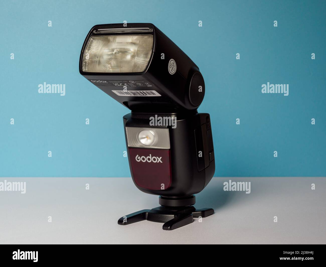 Godox camera flash speed light on a small light stand Stock Photo - Alamy