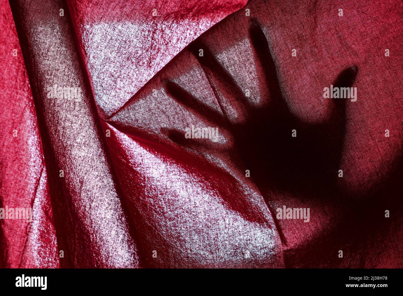Woman's hand against the fiery red fabric. Graphic resources Stock ...