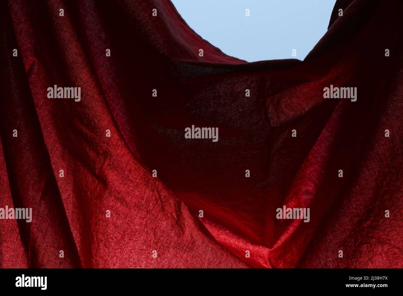Fiery red fabric with shadow streaks. Graphic resources Stock Photo - Alamy