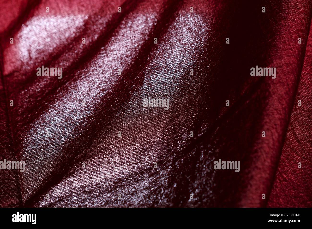Fiery red fabric with shadow streaks. Graphic resources Stock Photo - Alamy