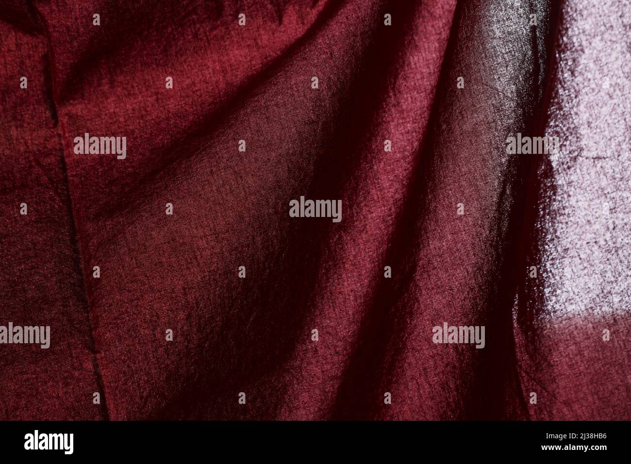Fiery red fabric with shadow streaks. Graphic resources Stock Photo - Alamy