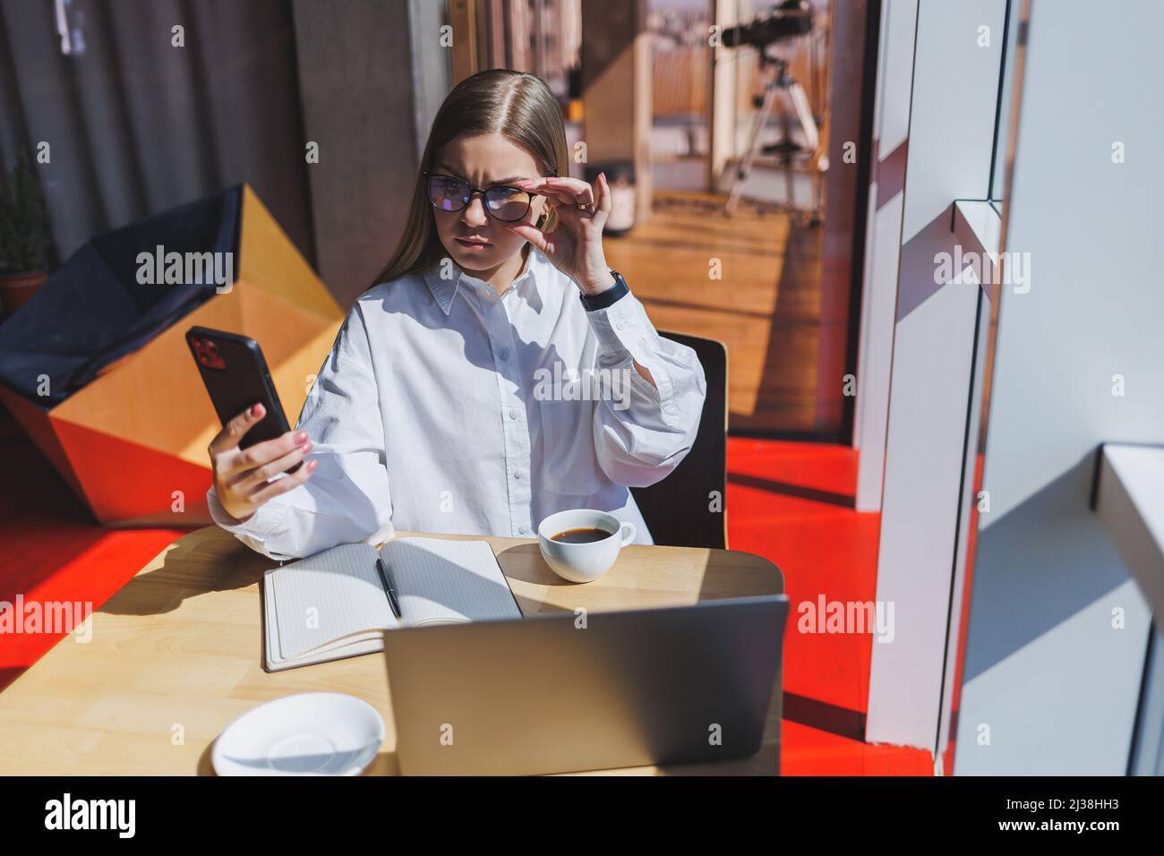 Businesswoman manager in a white shirt doing office work and smiling ...