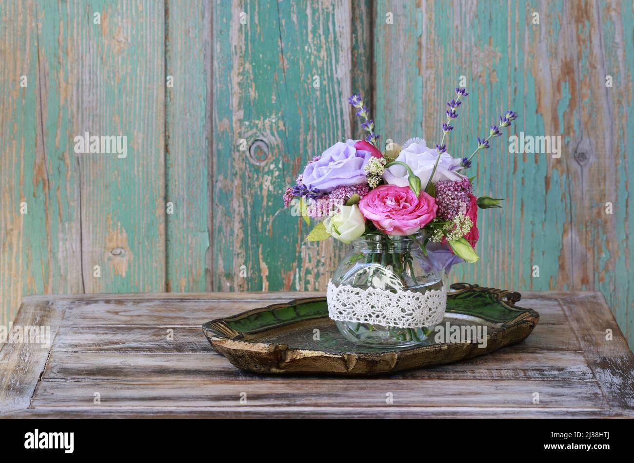 Bouquet with rose, eustoma and lavender flowers. Party decor Stock ...