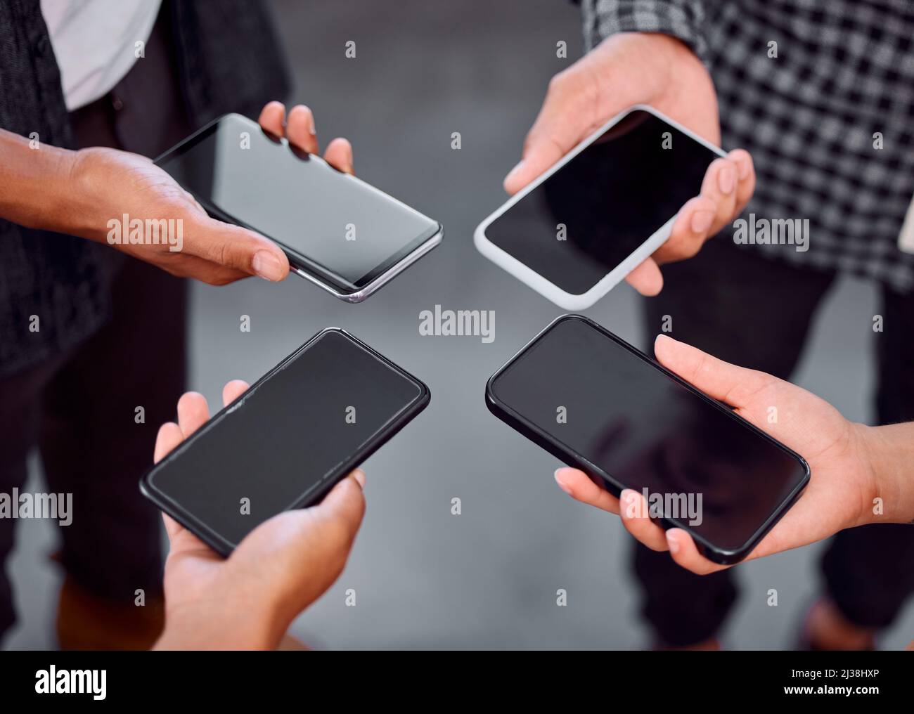 People in modern office mobile phones hi-res stock photography and ...
