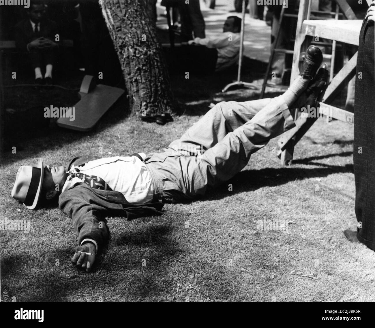 GARY COOPER relaxing / sleeping on set during location filming of MEET ...