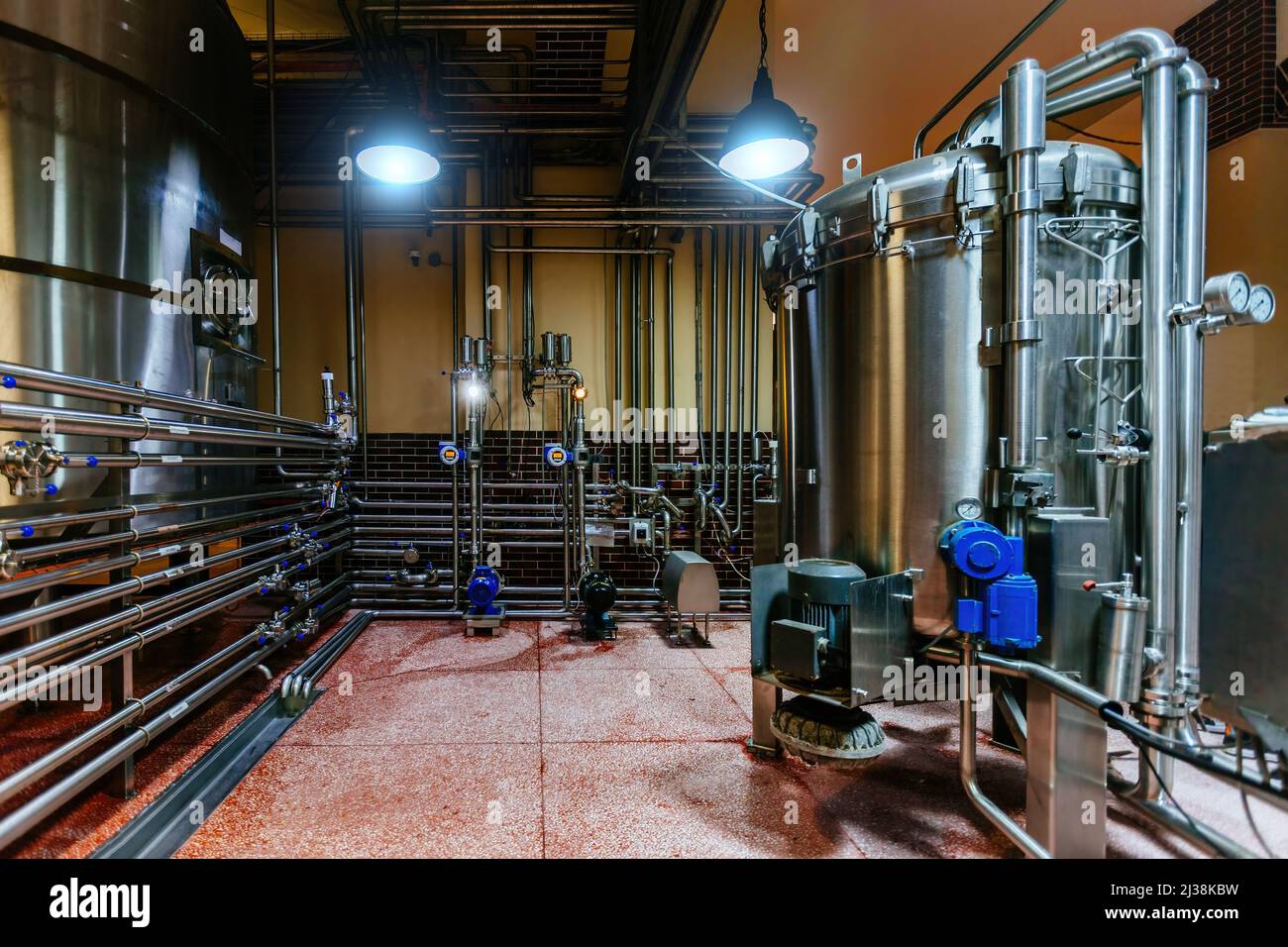 Craft beer production line in modern brewery Stock Photo - Alamy