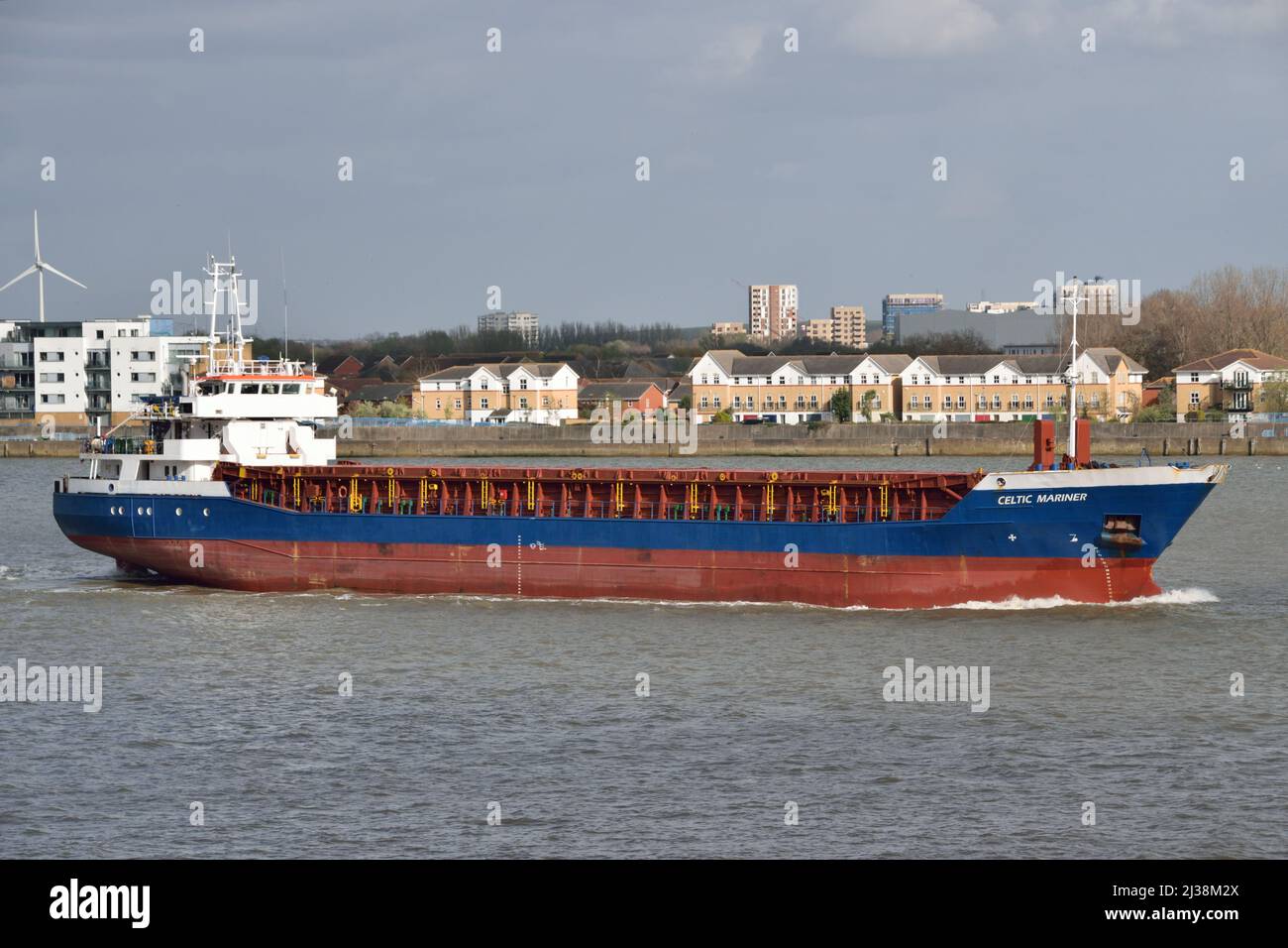 General cargo ship CELTIC MARINER heads up the River Thames to collect ...