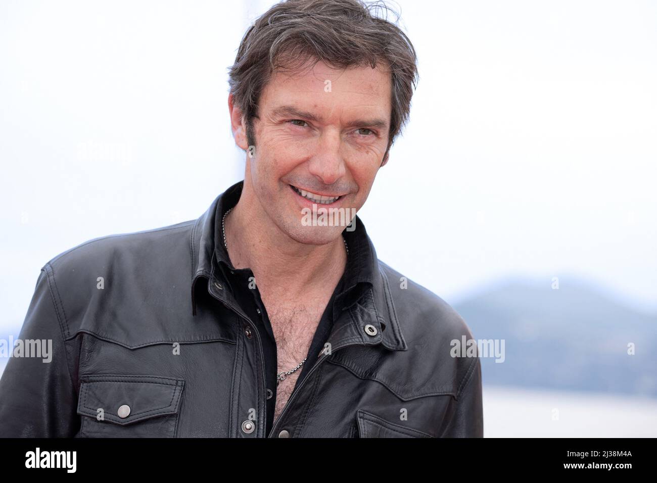 Franck Semonin attends the Section De Recherches photocall during the ...