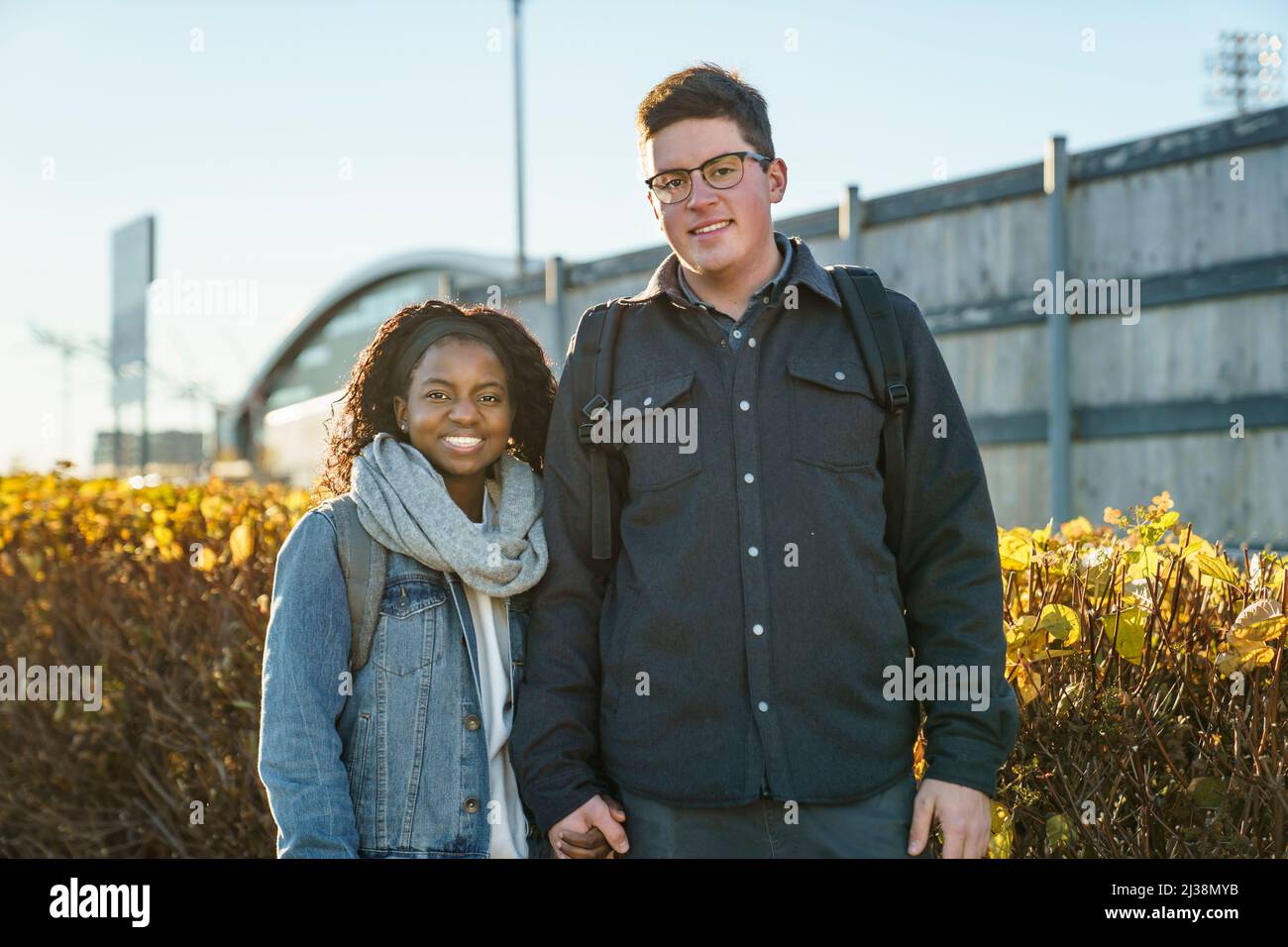 Couple of students at the university having good time Stock Photo - Alamy