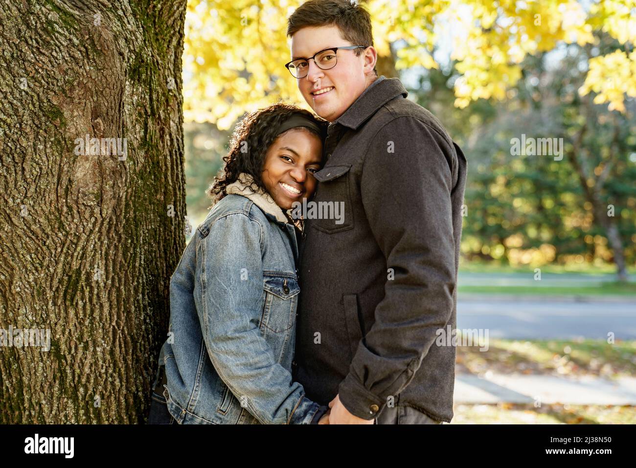 Romantic Teenage Couple In Autumn Park outside Stock Photo - Alamy