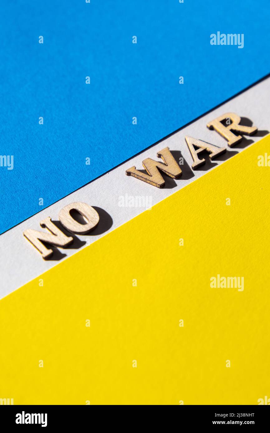 Ukrainian national flag made of paper. NO WAR text. Stop War. The ...