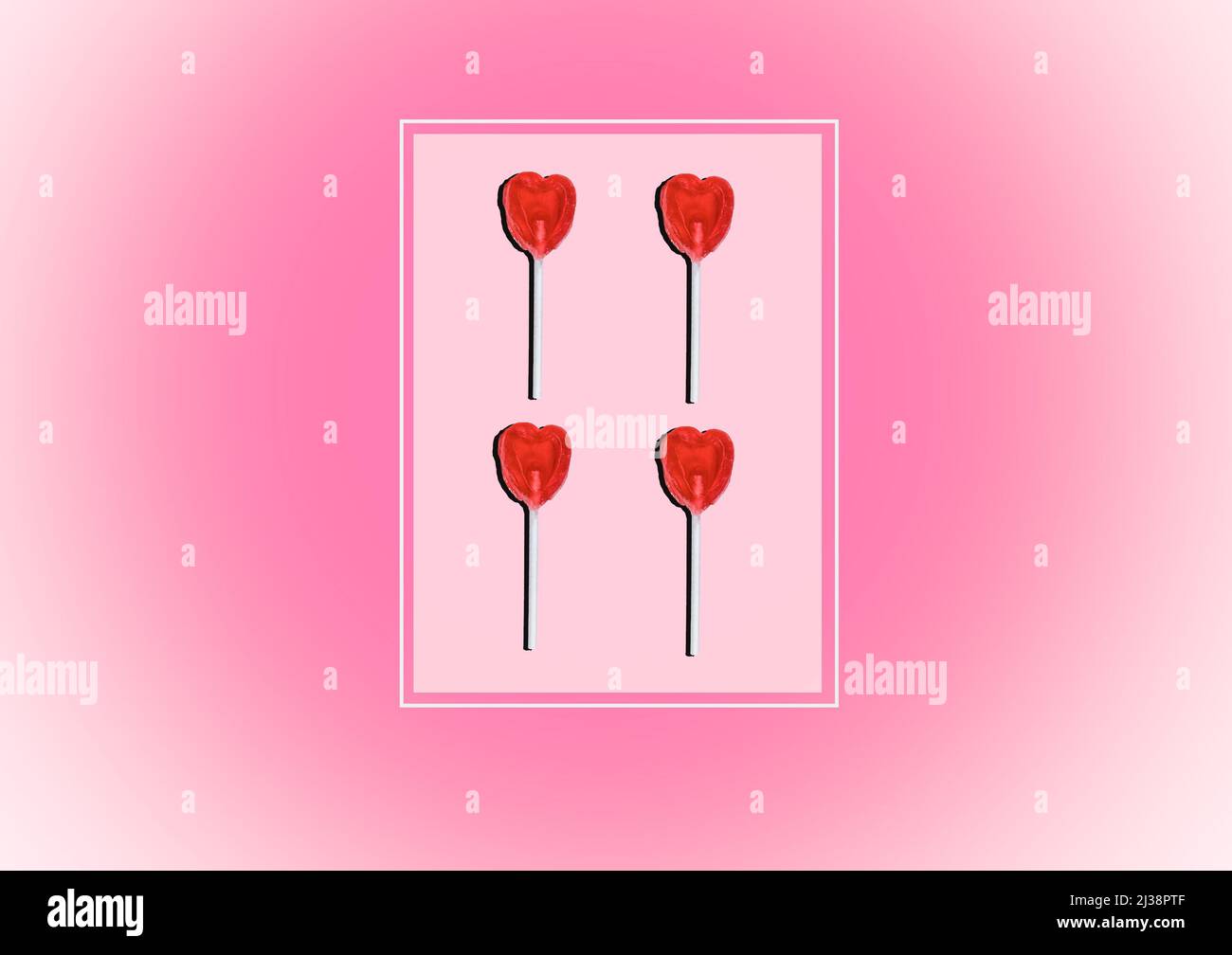 Four heart shaped lollipops on over white table. Pop art lollipop. copy ...