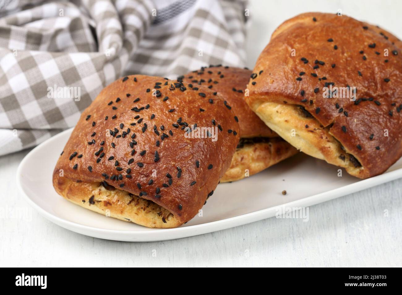 Crunchy buns with cabbage and nigella. Lunch dish Stock Photo - Alamy