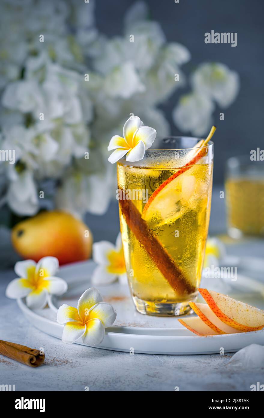 Pear lemonade with cinnamon. Summer refreshing cocktail. Fruit iced tea ...