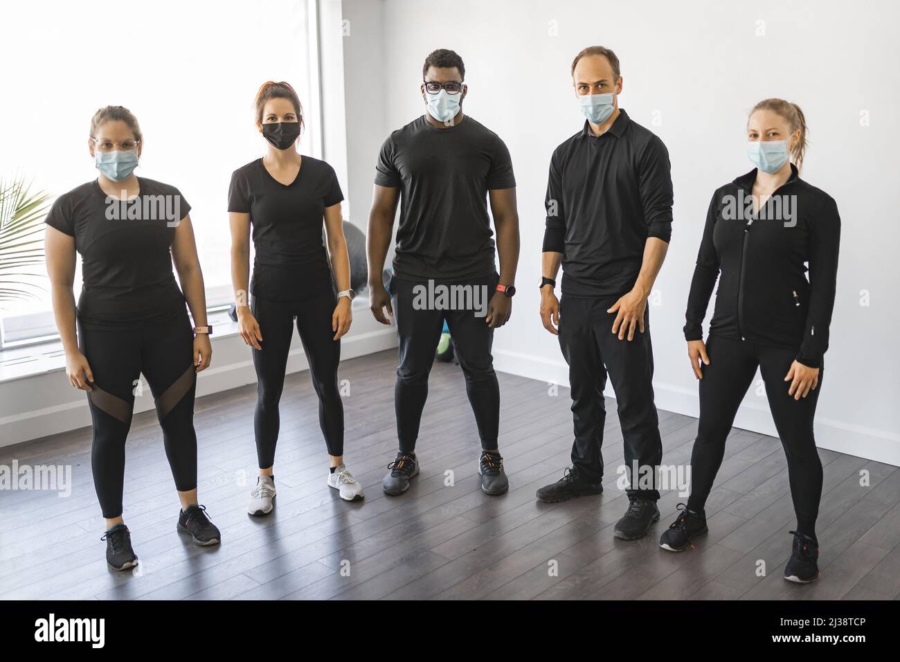 team of trainer standing with a smile in the training gym Stock Photo ...