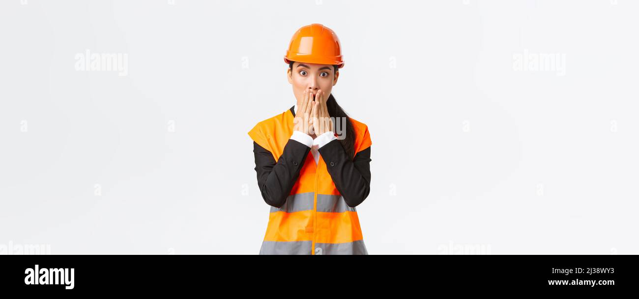 Concerned and worried asian female engineer having problem at ...