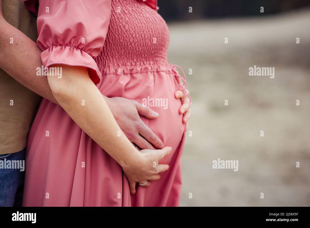 The couple hugging and waiting for their baby to born Stock Photo - Alamy