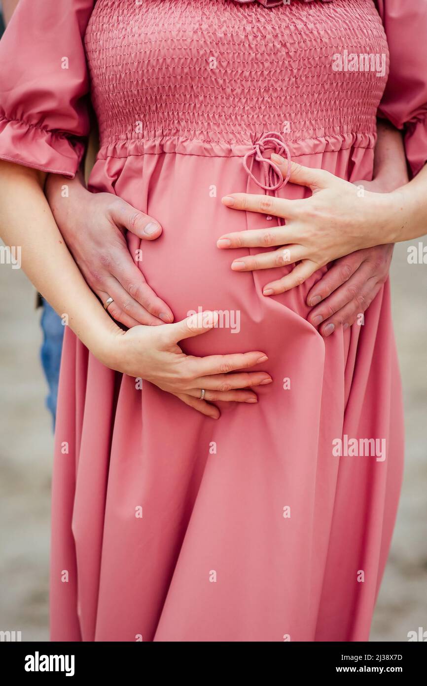 The couple hugging and waiting for their baby to born Stock Photo - Alamy
