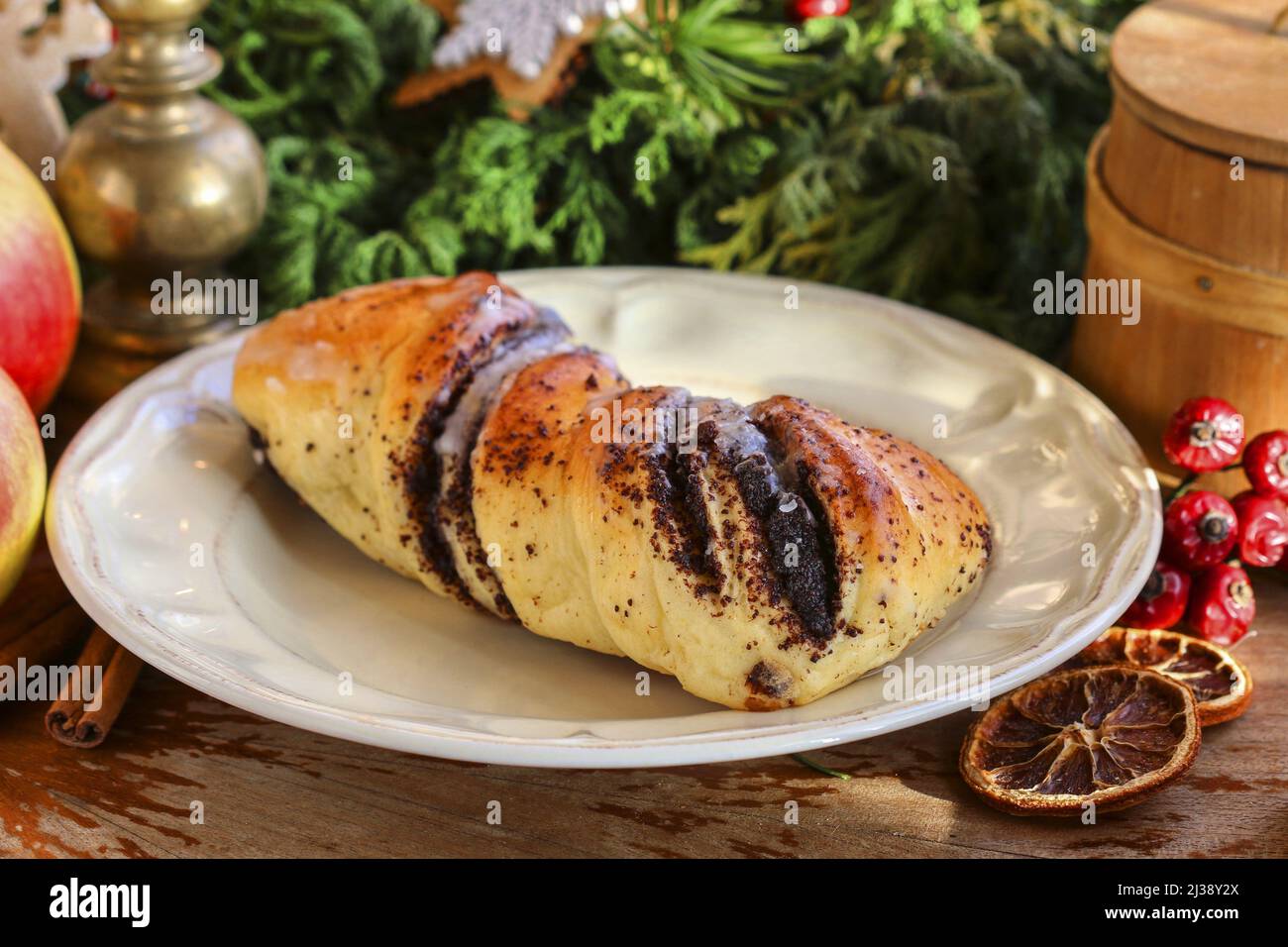 Christmas poppy seed cake on a plate. Festive dessert Stock Photo - Alamy