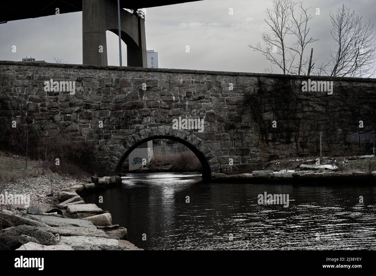 A greyscale daytime view of the Battleship Cove Fall River ...