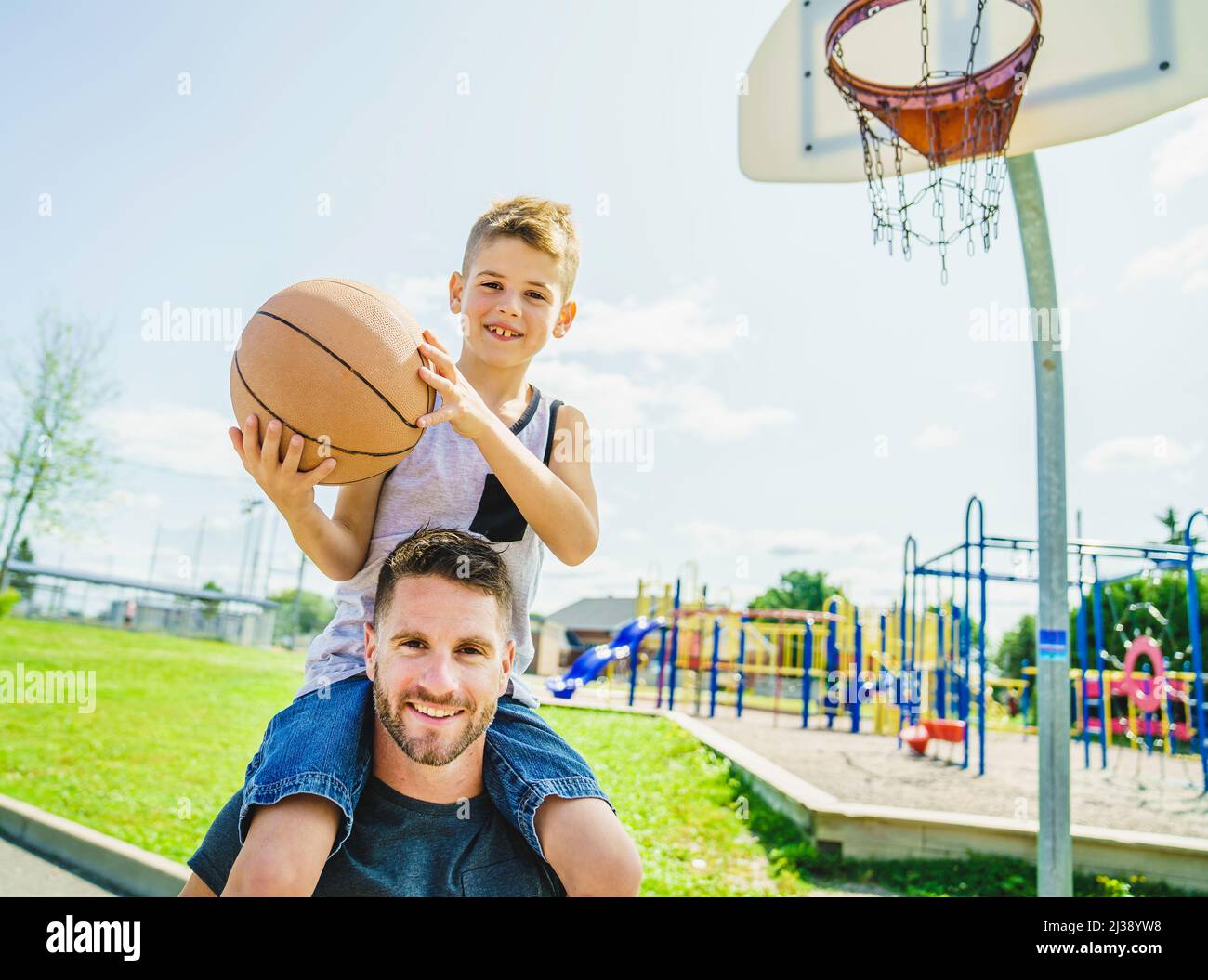 Happy basketball family portrait play this sport on summer season. The ...