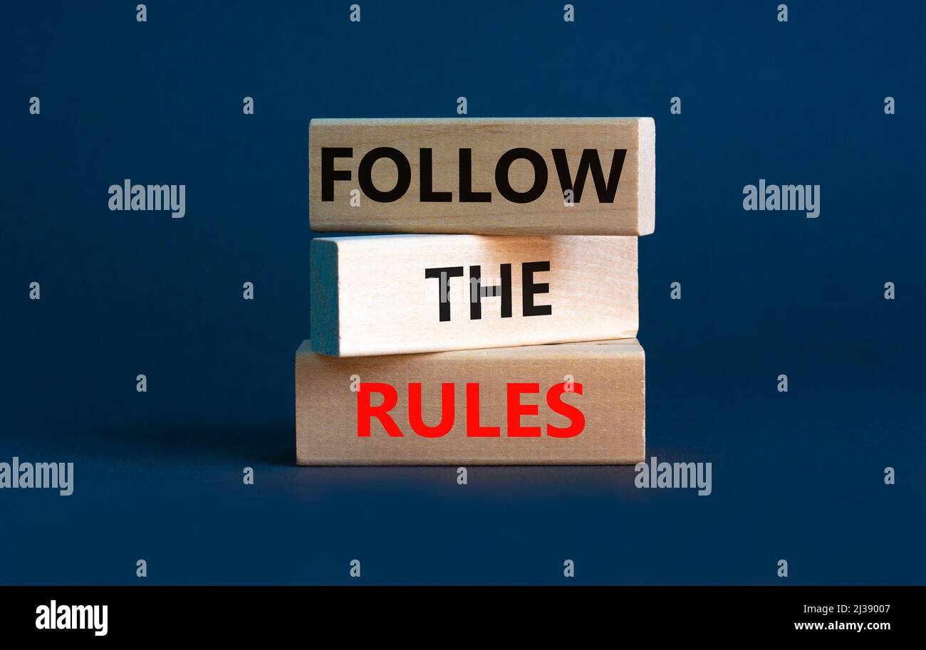Follow the rules symbol. Concept words Follow the rules on wooden ...