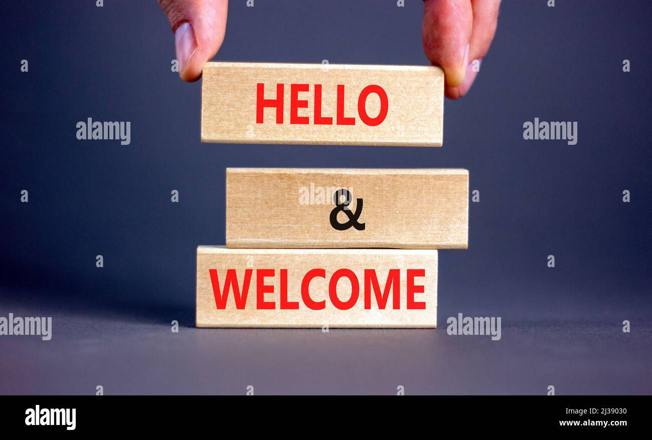 Hello and welcome symbol. Concept words Hello and welcome on wooden ...