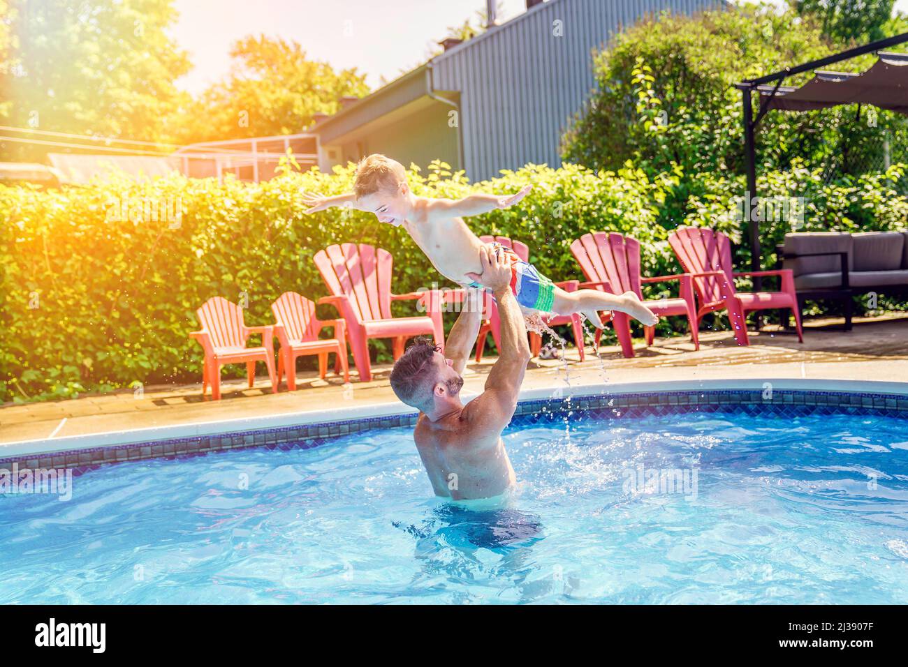 Man in kid pool hi-res stock photography and images - Alamy