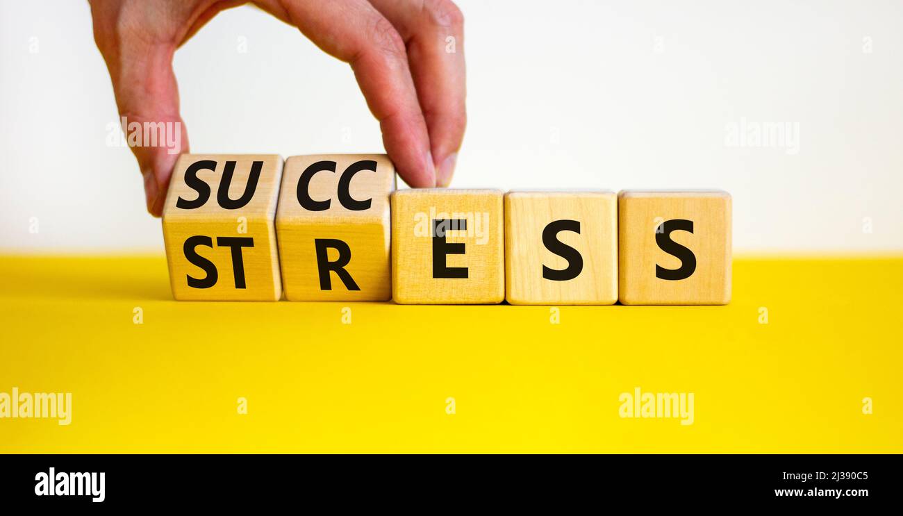 Success instead of stress symbol. Businessman turns cubes and changes ...