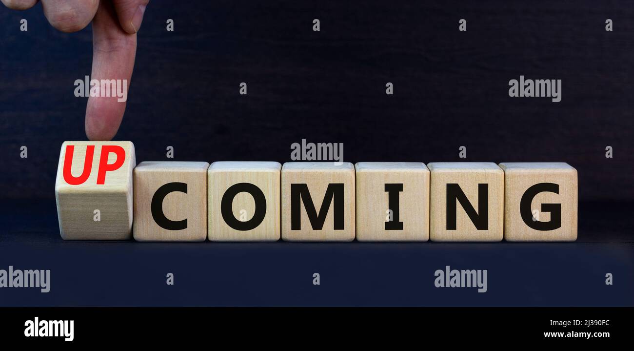 Coming or upcoming symbol. Turned wooden cubes and changed the word ...