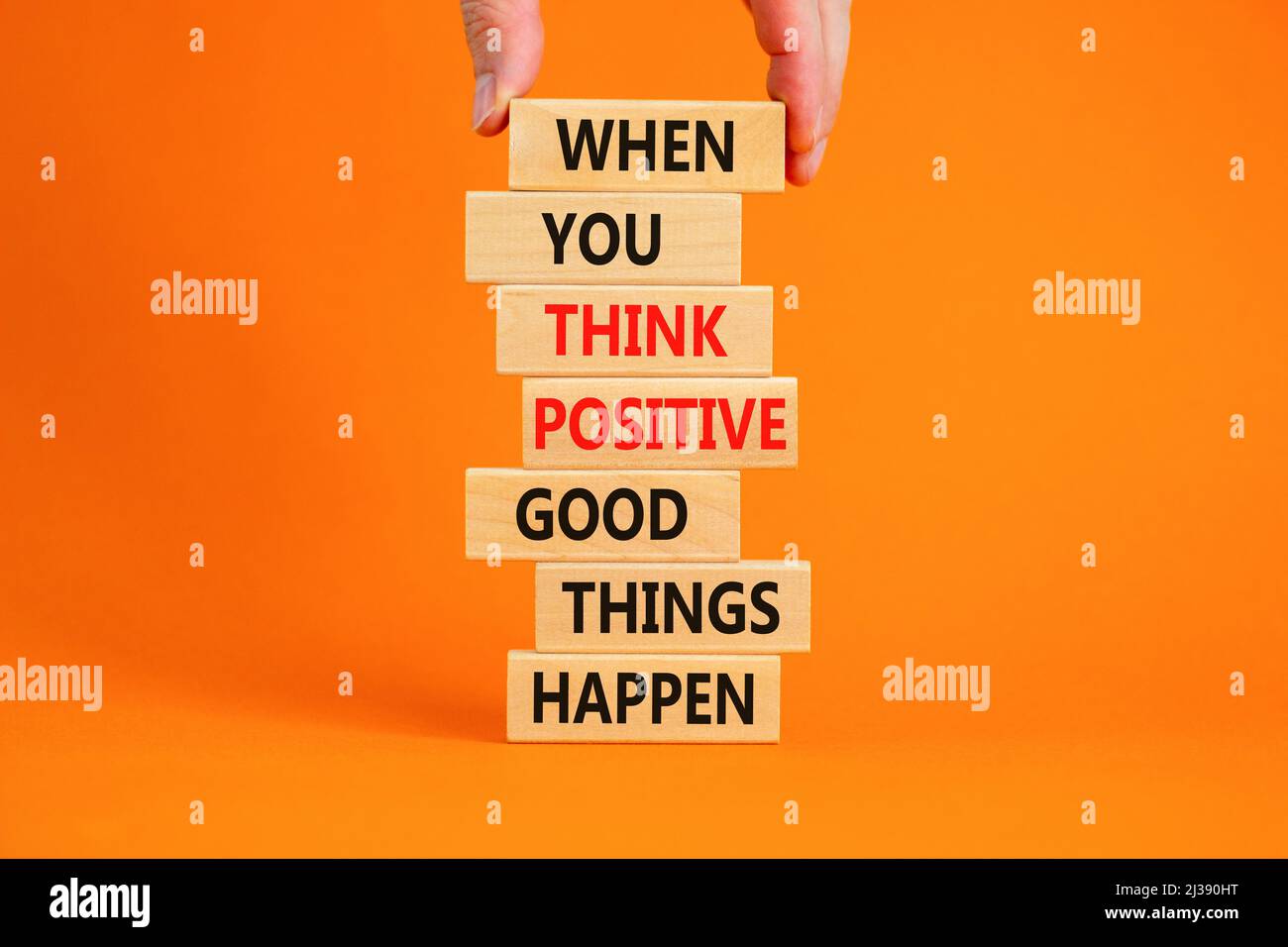 Think positive symbol. Wooden blocks with concept words When you think ...