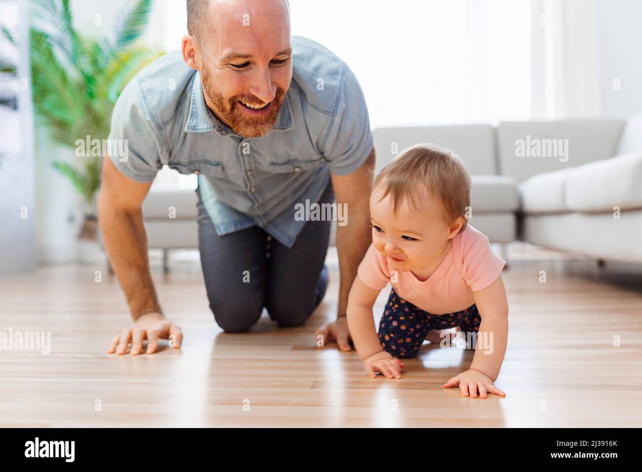 father and his baby at home having fun Stock Photo - Alamy