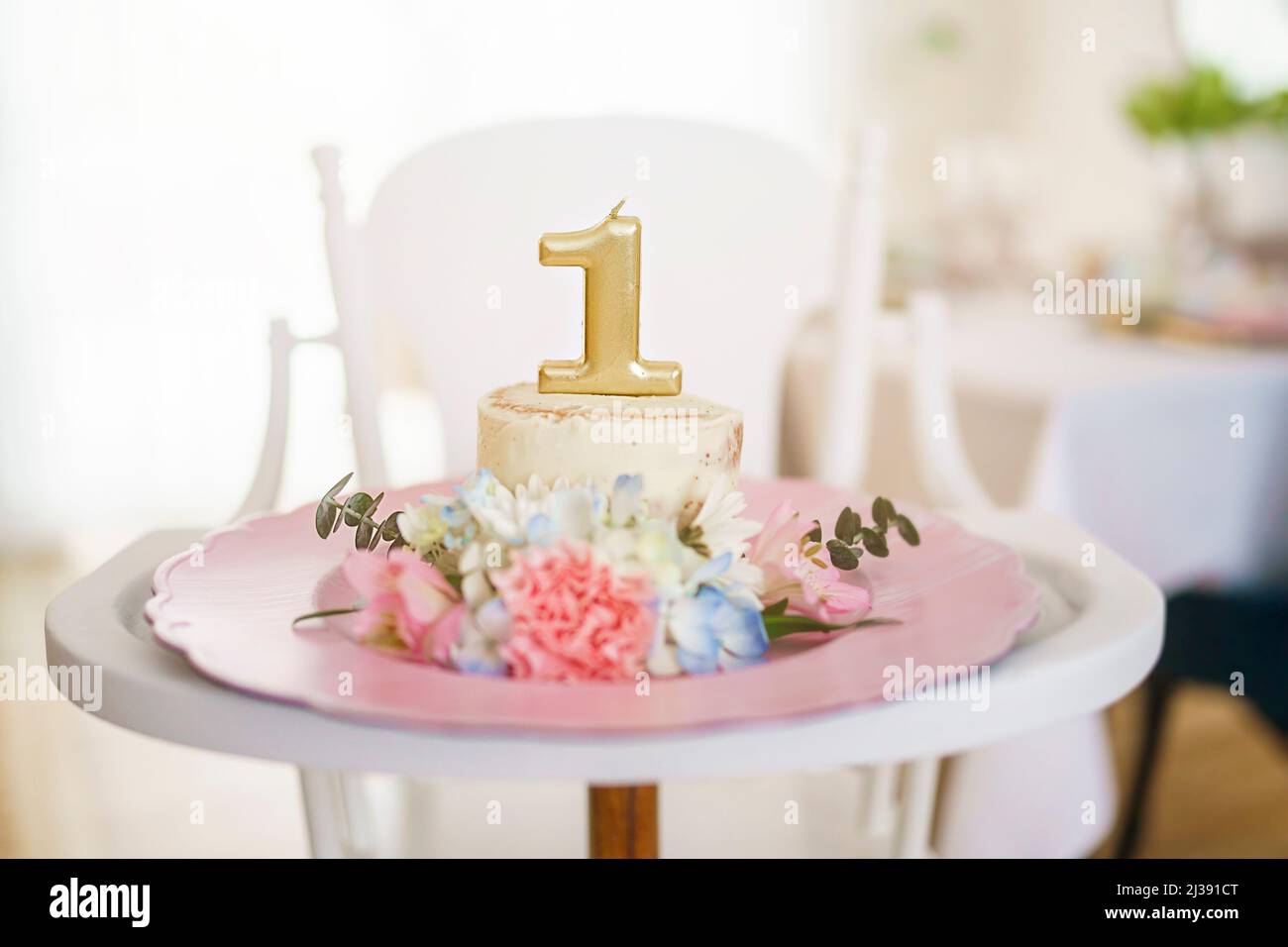 Birthday cake on a chair for the special little baby girl Stock Photo ...